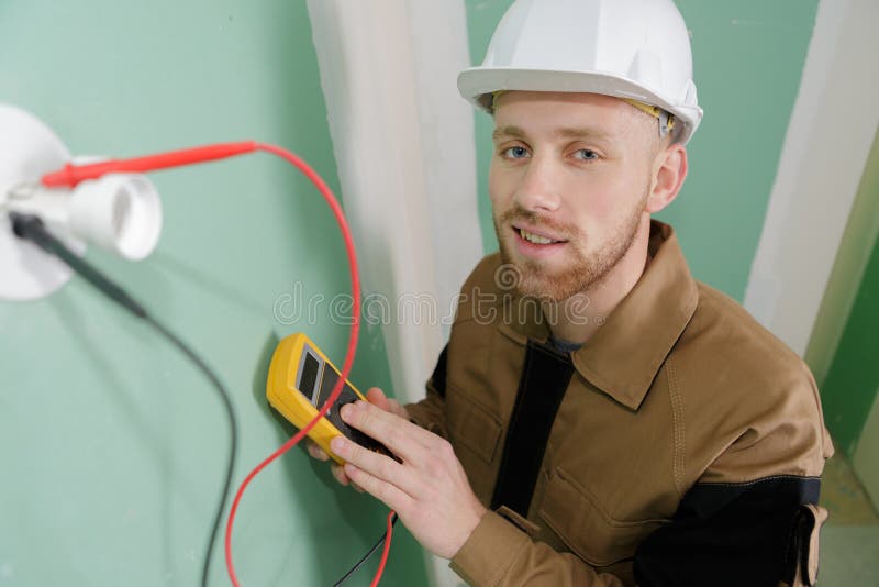 Electrician Checking the Current Stock Photo - Image of electricity ...