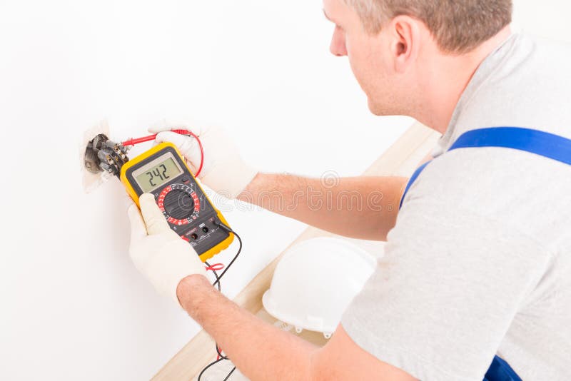 Electrician Checking Socket Stock Image - Image of building ...