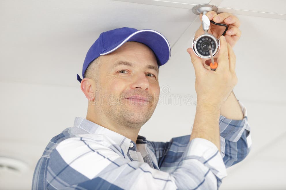 Electrician Connecting Cctv Camera in Office Stock Photo - Image of ...