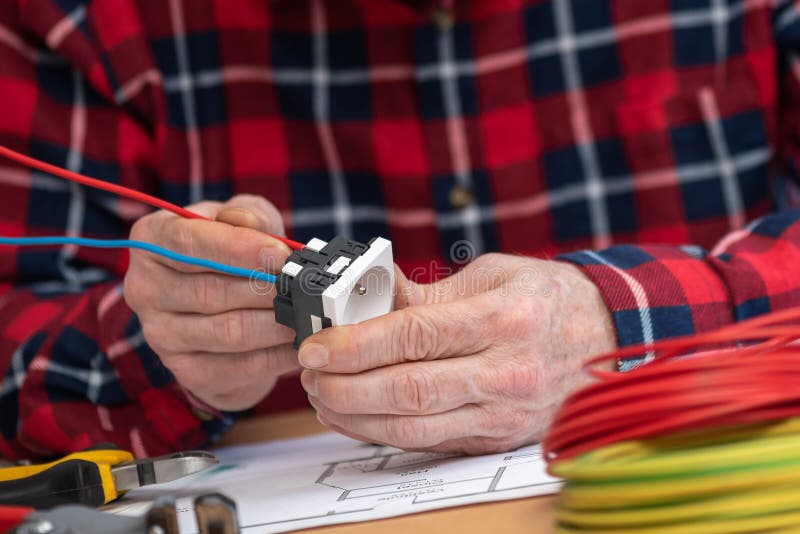 Electrician Connecting a Wire into a Power Socket Stock Image - Image ...