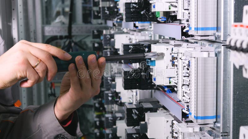 Electrician Connecting Wires on a Device Stock Video - Video of ...