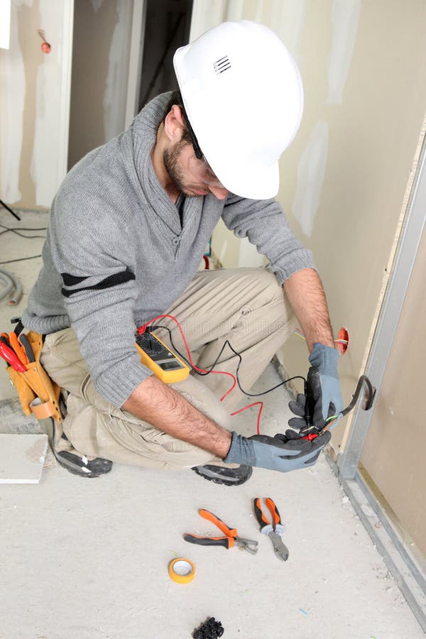 Electrician on Construction Site Stock Photo - Image of cables ...