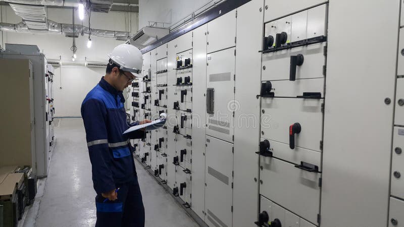 Electrician Cut Off Electrical System and Lock Out for Safety Working ...