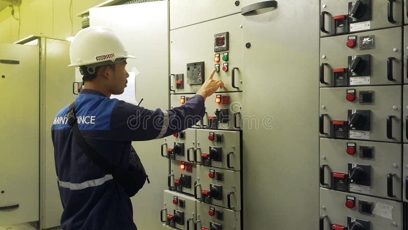 Electrician Cut Off Electrical System and Lock Out for Safety Working ...