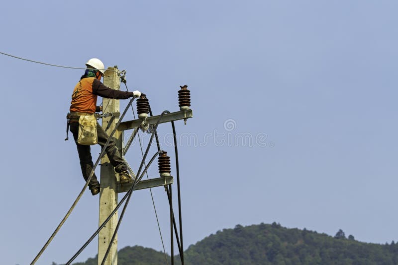 Electrician on Electric Pole Stock Photo - Image of industrial ...