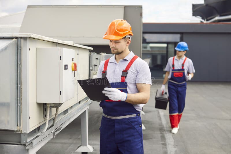 Electrician Engineer or Technician Checking the Condition of ...