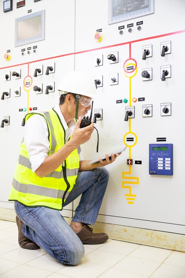 Electrical engineering man stock image. Image of medium - 247864579