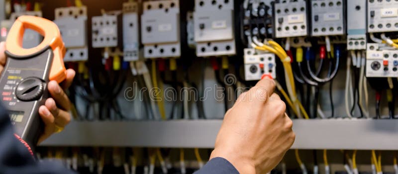 Electrician Engineer Work Tester Measuring Voltage and Current of Power ...