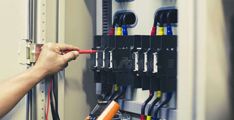 Electrician Engineer Work Tester Measuring Voltage and Current of Power ...