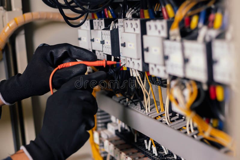 Electrician Engineer Work Tester Measuring Voltage and Current of Power ...