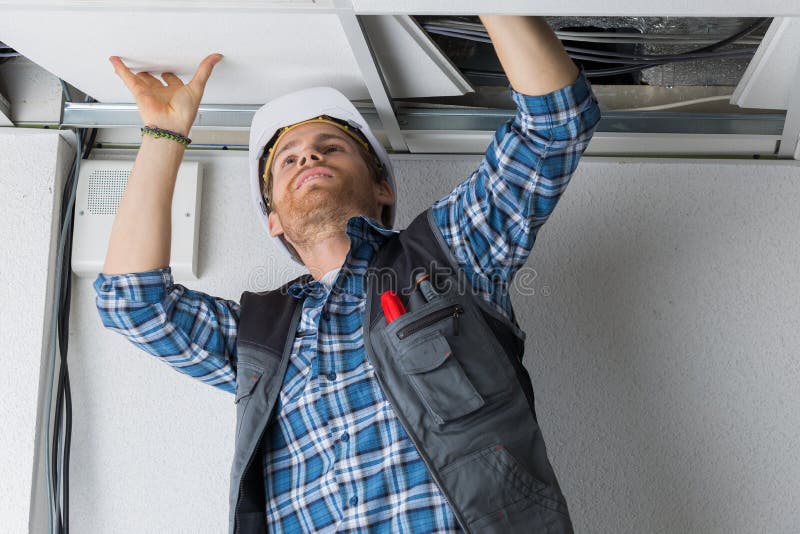 Electrician Fitting Cable for Ceiling Light Stock Photo - Image of ...