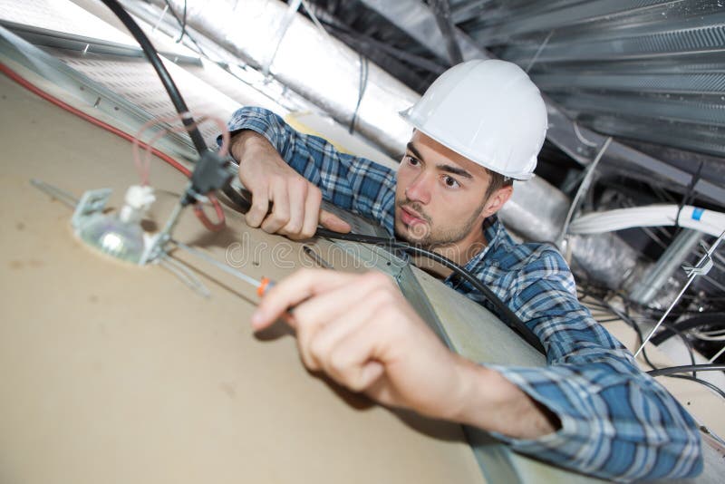 Electrician Fitting Cable for Ceiling Light Stock Photo - Image of ...