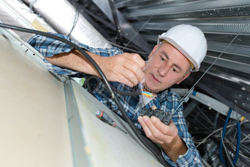 Electrician Fixing Lights on Ceiling Stock Photo - Image of fixing ...