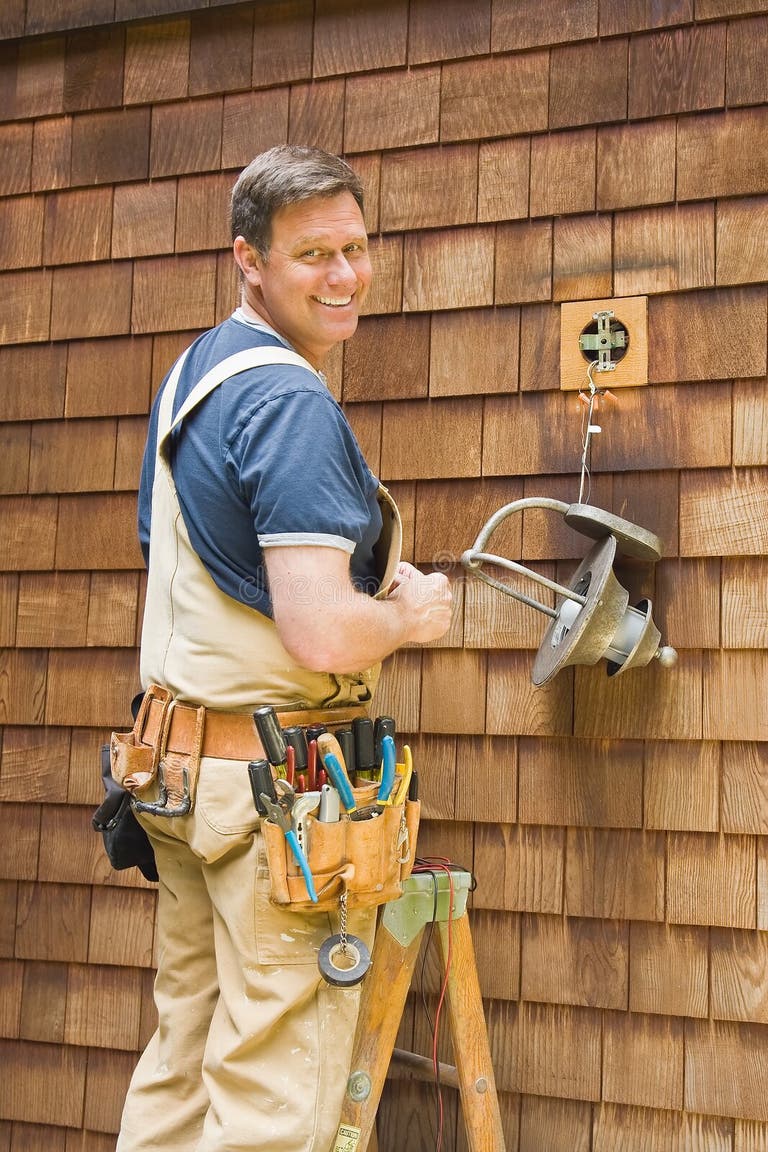 156 Electrician Man Standing Fixing Light Stock Photos - Free & Royalty ...