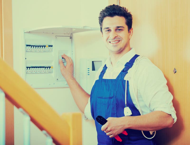 Electrician Fixing Problems of Automatic Electric Meter Stock Image ...