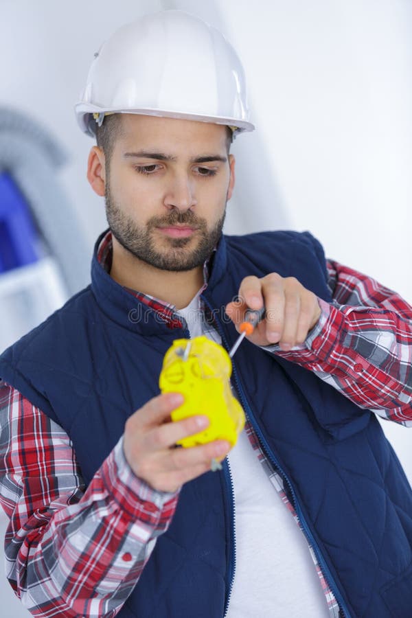 Electrician Fixing a Socket Stock Image - Image of person, manually ...