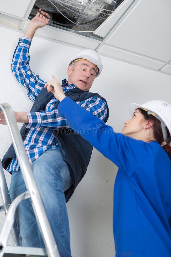 Electrician Fixing Wires on Ceiling Stock Photo - Image of apprentice ...