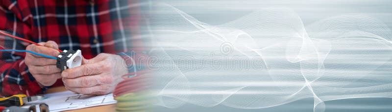 Electrician Connecting a Wire into a Power Socket; Panoramic Banner ...