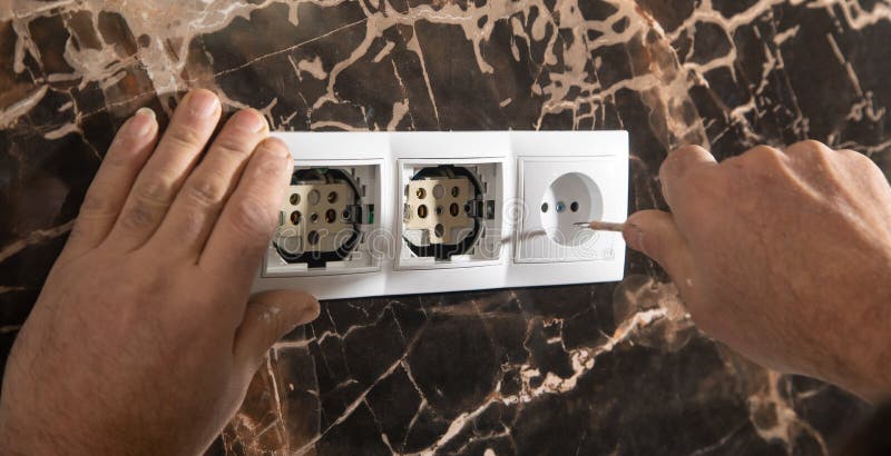 Electrician Installing a Wall Socket at Home Stock Photo - Image of ...