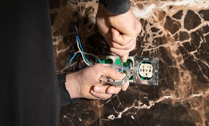 Electrician Installing a Wall Socket at Home Stock Photo - Image of ...