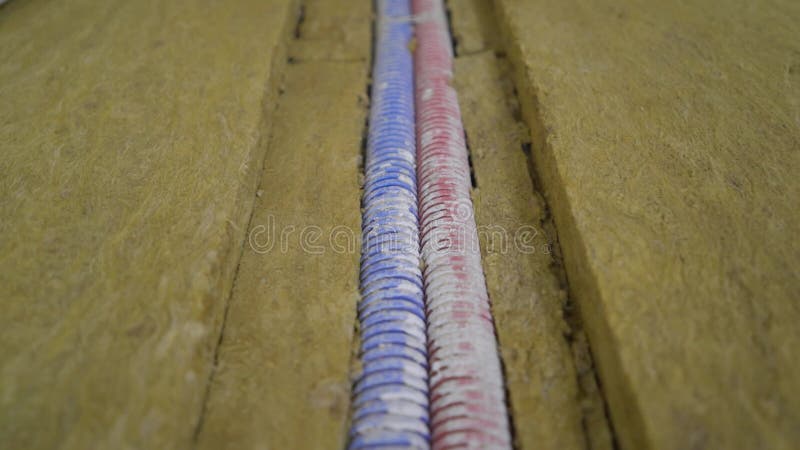 Heating System of the House Heating. Electrician Installing Corrugated ...