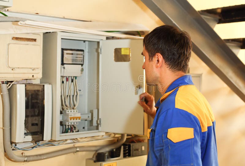 Electrician at work stock photo. Image of cabling, mechanic - 20260986