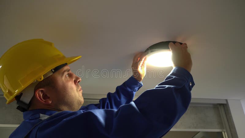Electrician Man Remove Led Panel Light from Ceiling and Inspect Wire ...