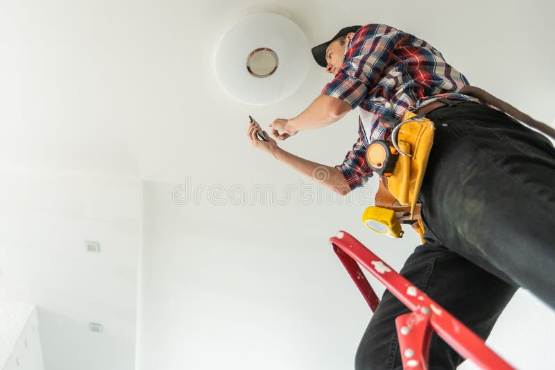 Electrician Man Worker Installing Ceiling Lamp Stock Image - Image of ...