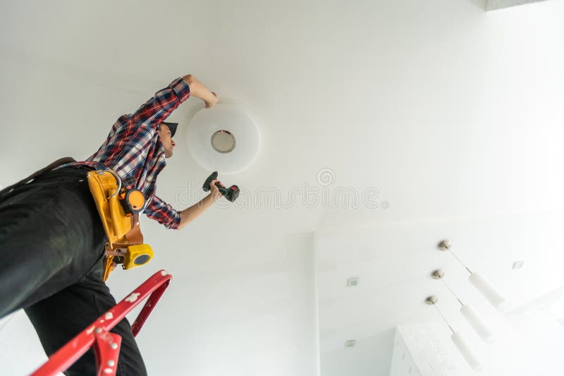 Electrician Man Worker Installing Ceiling Lamp Stock Photo - Image of ...