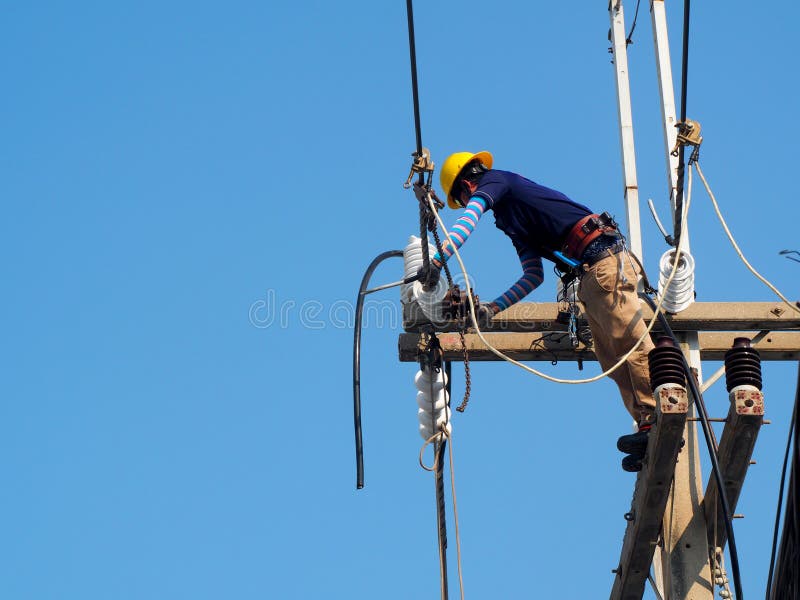 Electrician Man Working at Height and Dangerous ,high Voltage Power ...
