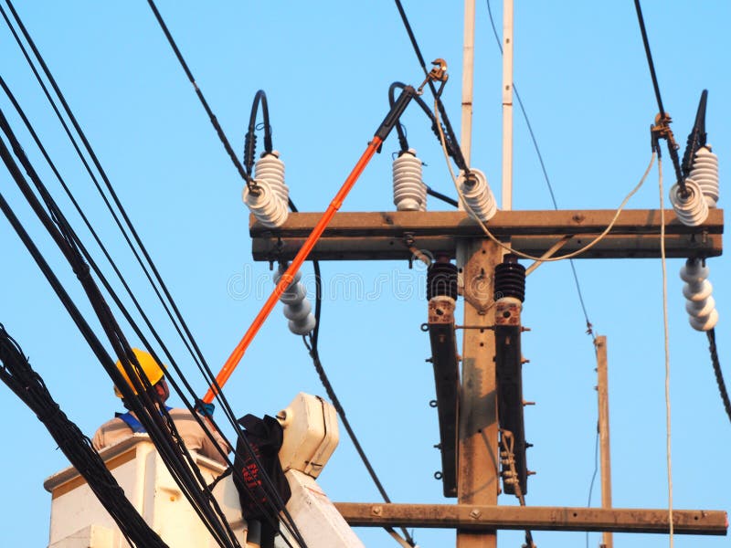 Electrician Man Working at Height and Dangerous ,high Voltage Power ...