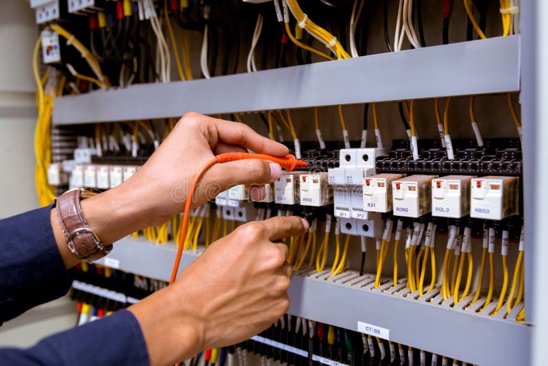 Electrician Measurements with Multimeter Testing Current Electric Stock ...