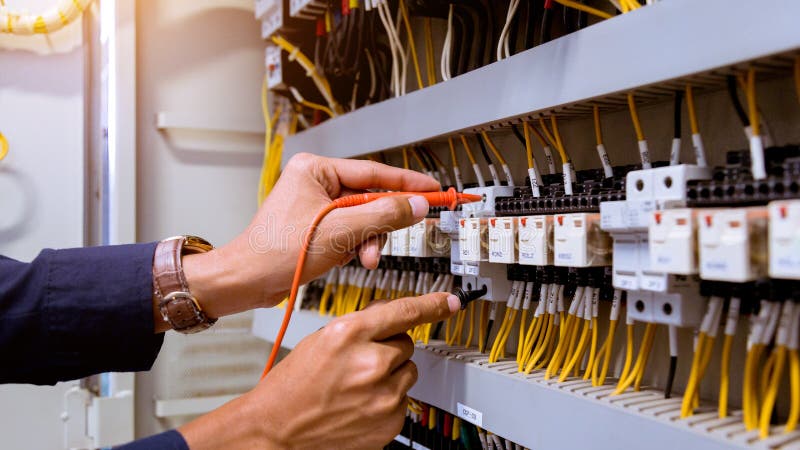 Electrician Measurements with Multimeter Testing Current Electric Stock ...