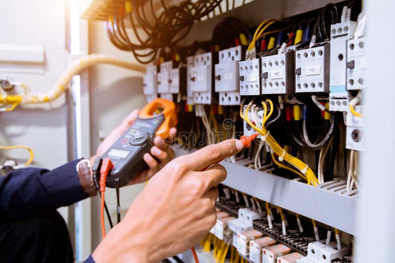 Electrician Measurements with Multimeter Testing Current Electric Stock ...