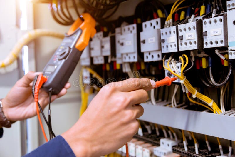 Electrician Measurements with Multimeter Testing Current Electric Stock ...