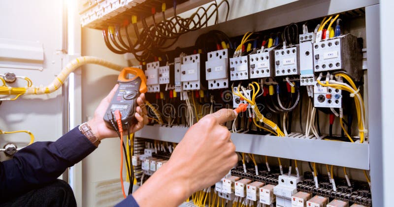 Electrician Measurements with Multimeter Testing Current Electric in ...