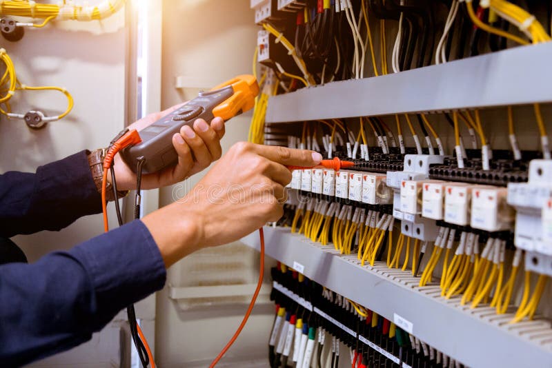 Electrician Measurements with Multimeter Testing Current Electric in ...