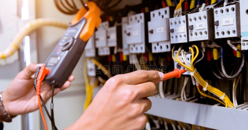 Electrician Measurements with Multimeter Testing Current Electric in ...