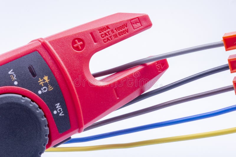 The Electrician Measures the Current in the Phase Wire with a Meter ...