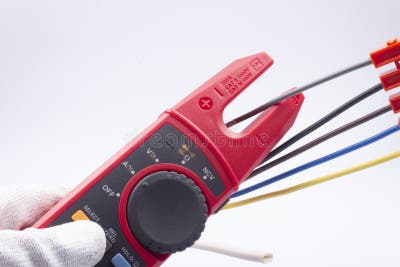 The Electrician Measures the Current in the Phase Wire with a Meter ...