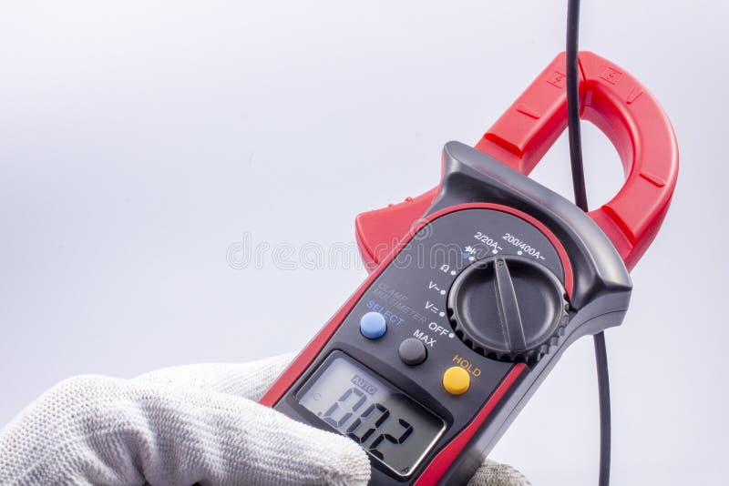 The Electrician Measures the Current in the Phase Wire with a Meter ...