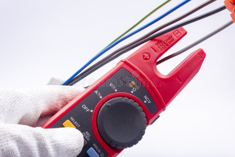 The Electrician Measures the Current in the Phase Wire with a Meter ...