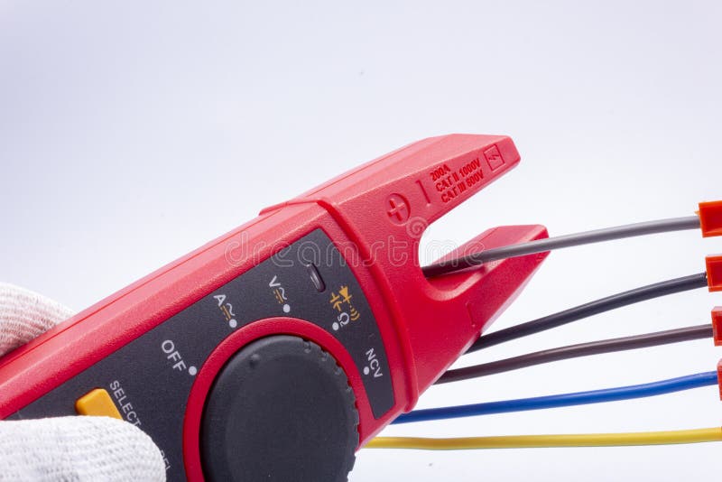 The Electrician Measures the Current in the Phase Wire with a Meter ...