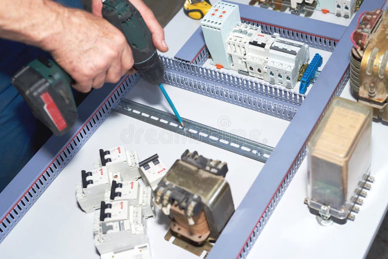 The Electrician Performs the Installation and Configuration of High ...