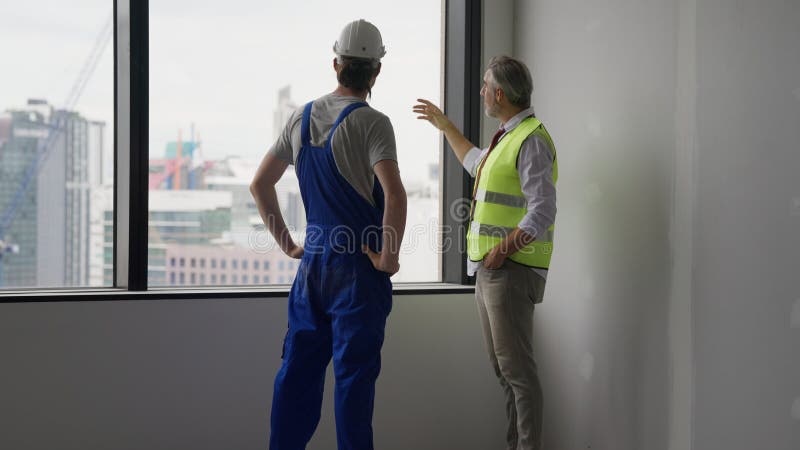 Electrician Technician and Contractor Foreman Talking Together on ...
