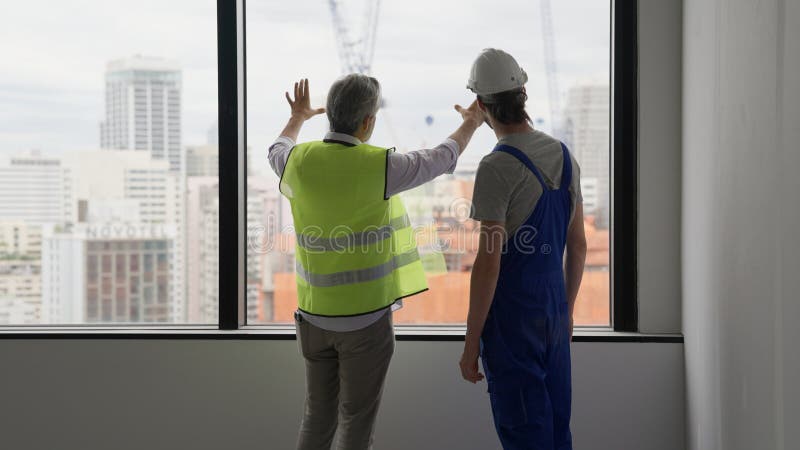 Electrician Technician and Contractor Foreman Talking Together on ...