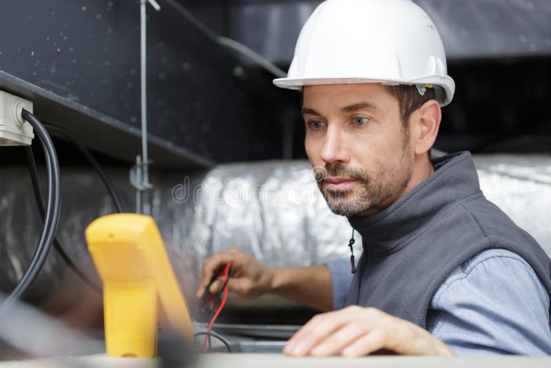Electrician Technician at Work Measures Voltage Stock Image - Image of ...
