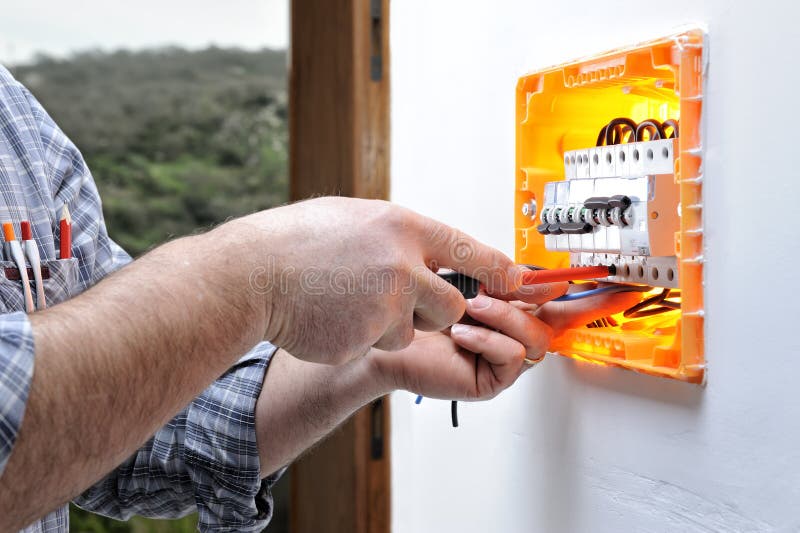 Electrician Technician Repairs the Electrical Panel of a Residential ...