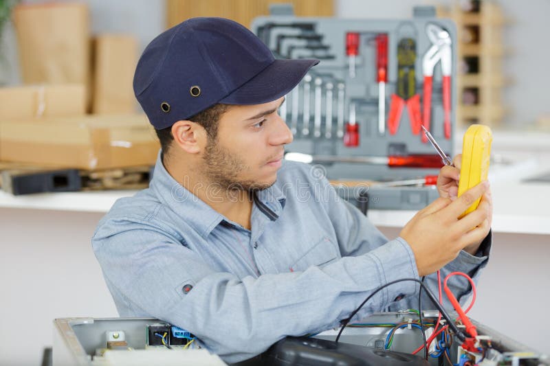 Electrician Technician at Work on Residential Electrical Panel Stock ...
