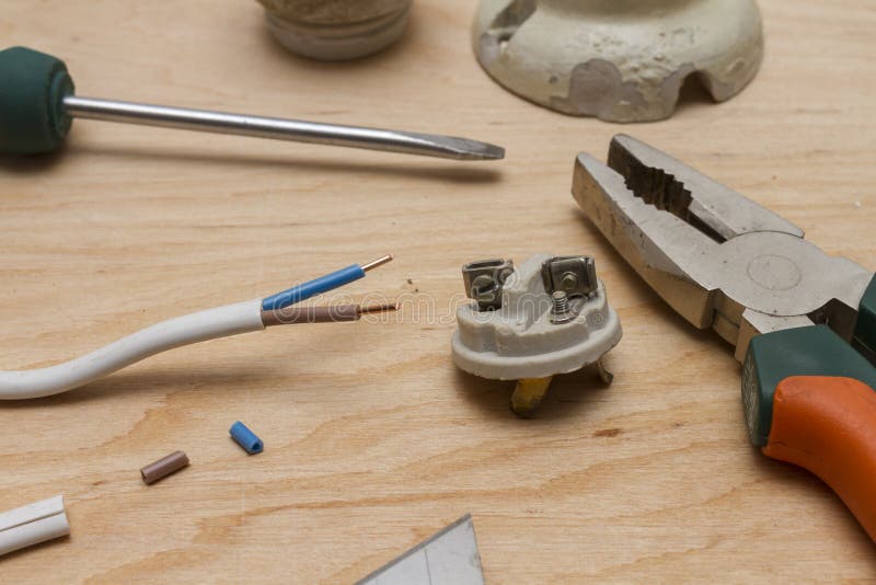 Electrician Tools, Cable, and Ceramic Cartridge for Light Bulbs. Stock ...